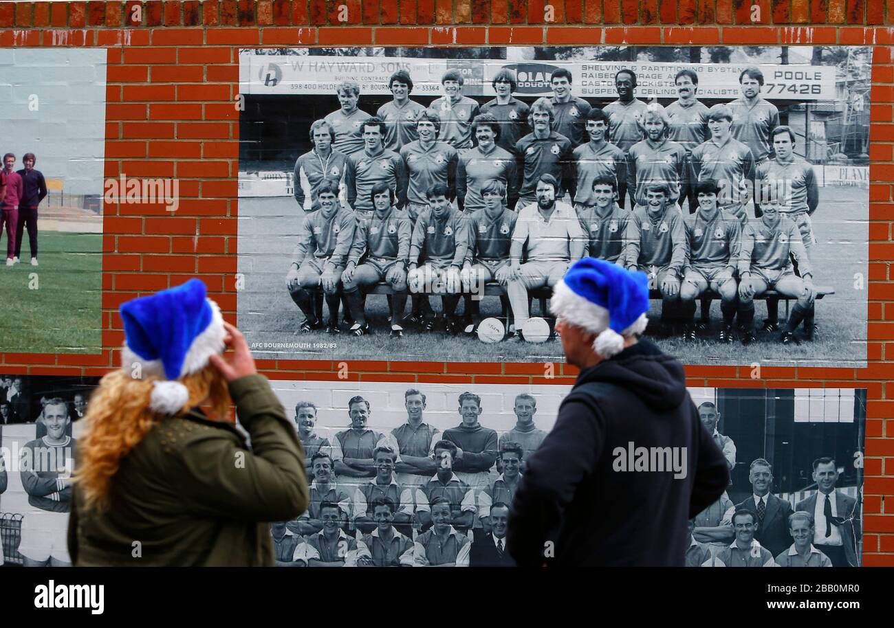 Football fans look at historic AFC Bournemouth pictures on the wall ...