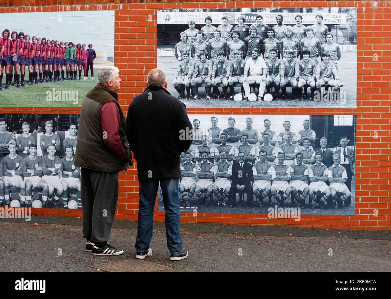 Football fans look at historic AFC Bournemouth pictures on the wall ...