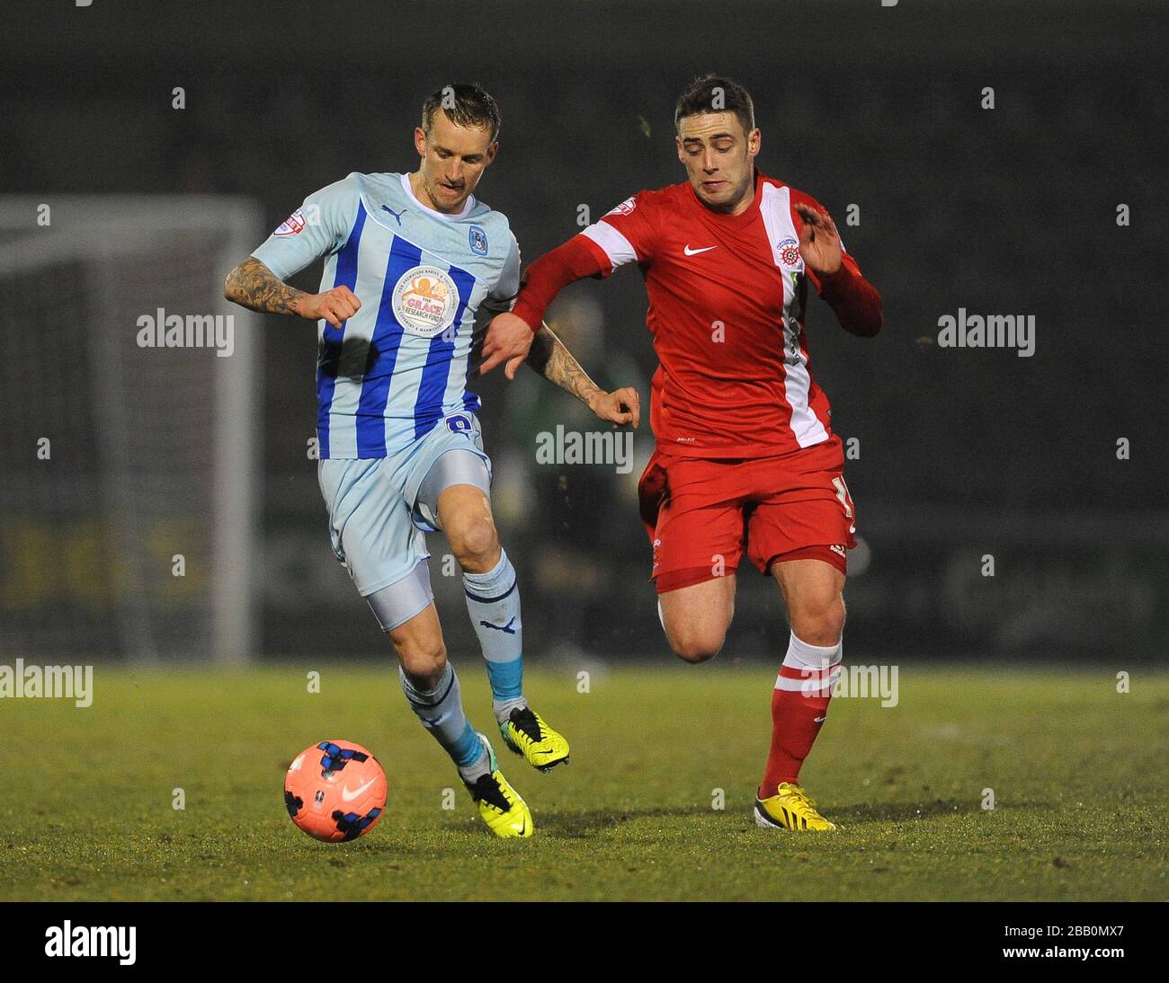 Coventry City's Carl Baker (left) and Hartlepool United's Jack Compton ...