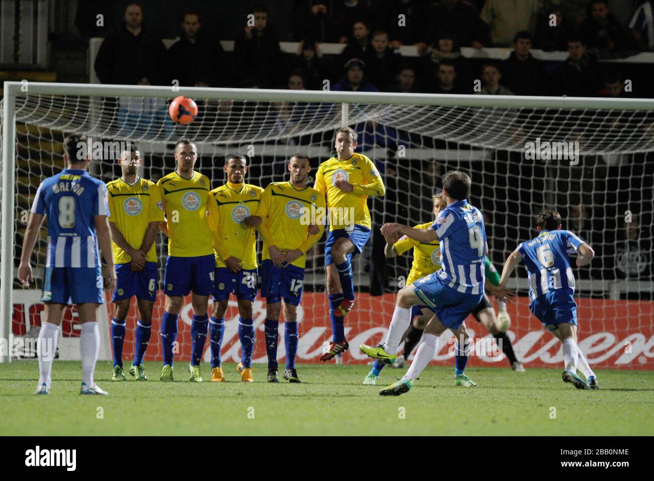 Matty Dolan of Hartlepool fires his free kick over the Coventry wall ...