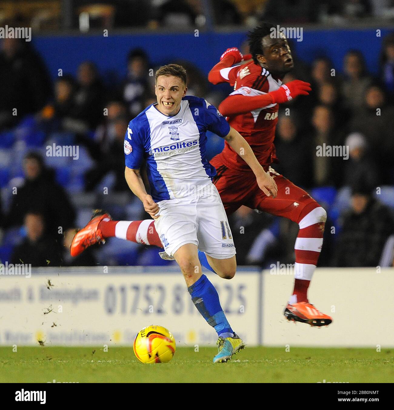 Birmingham City's Mitch Hancox (left) and Middlesbrough's Kei Kamara ...