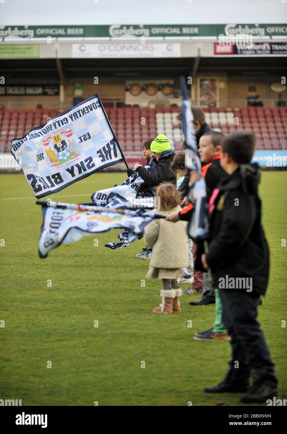 Mascots with flags before kick-off Stock Photo - Alamy