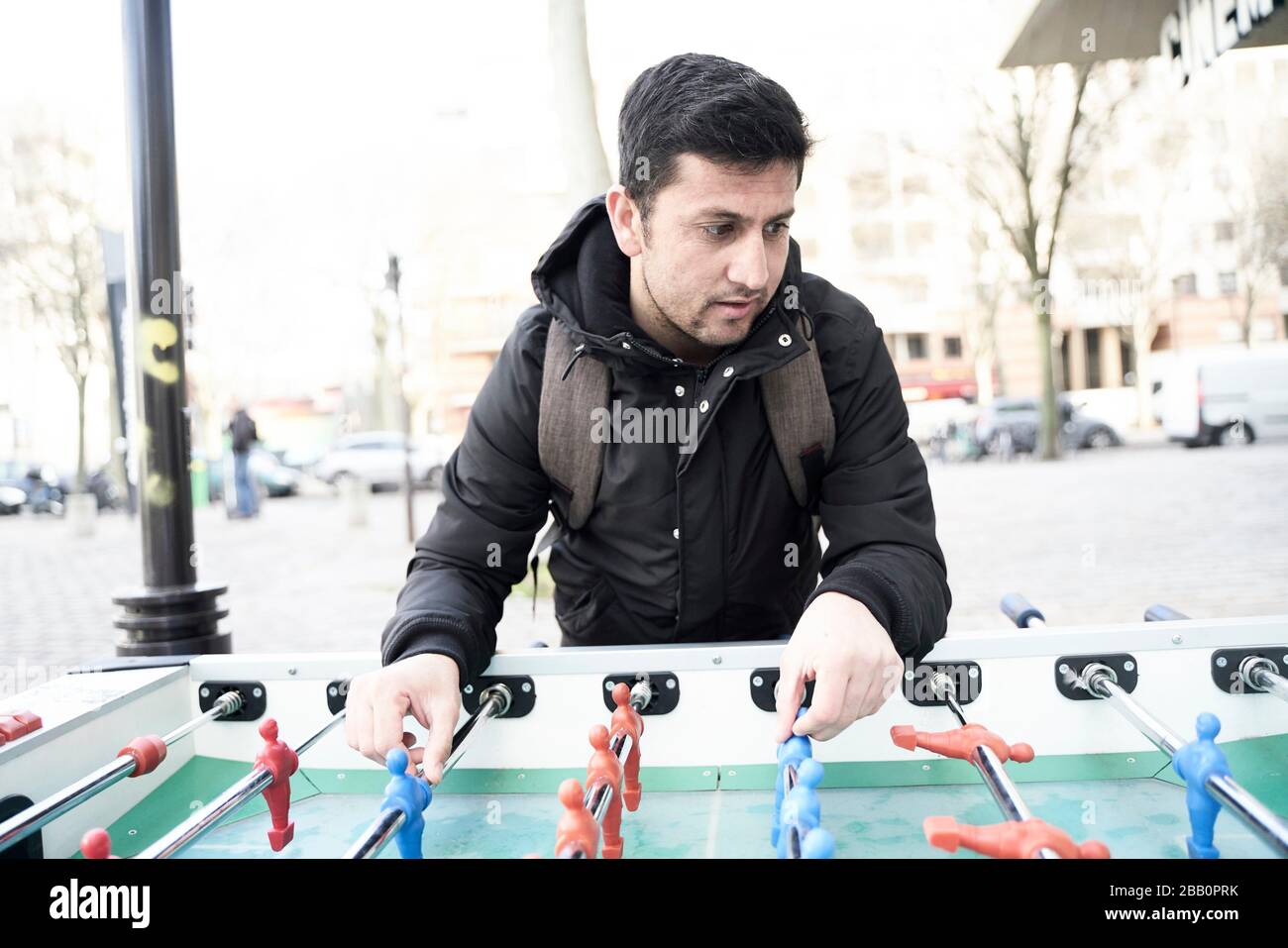 Middle eastern male playing football hi-res stock photography and ...