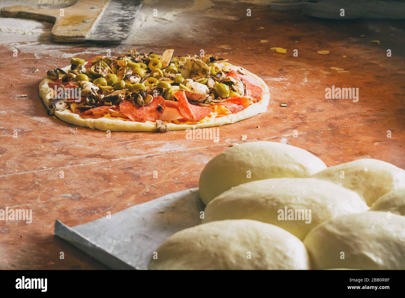 Fresh original Italian raw pizza, dough preparation in traditional ...