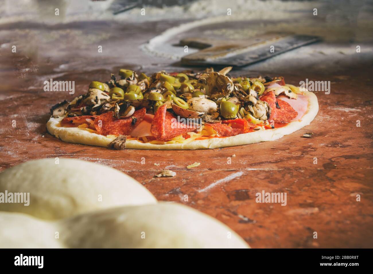 Fresh original Italian raw pizza, dough preparation in traditional ...