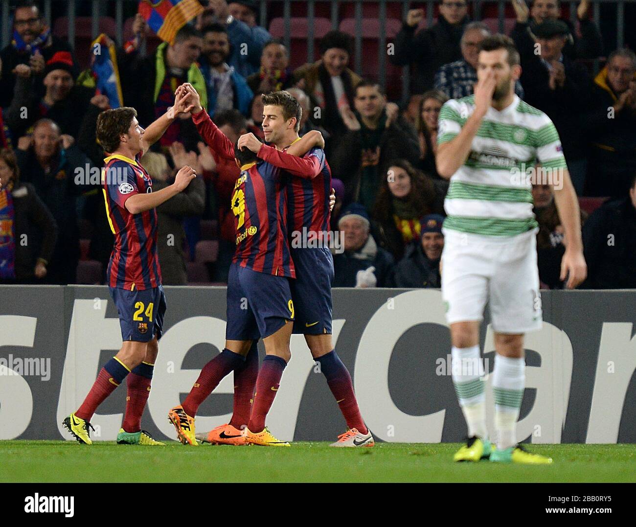 Barcelona's Gerard Pique (centre) celebrates after scoring his team's ...