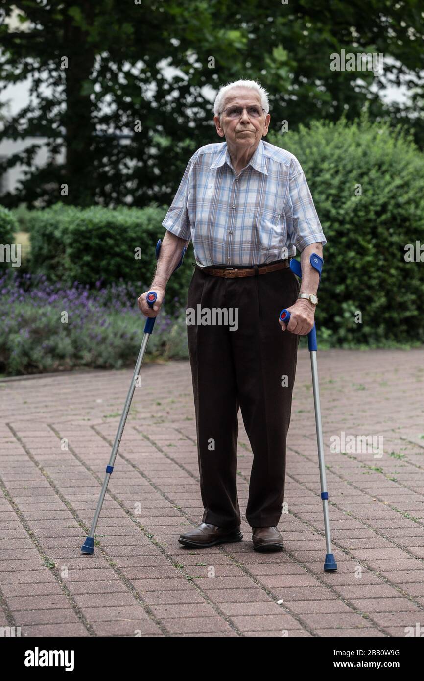 Old man walking slowly hi-res stock photography and images - Alamy