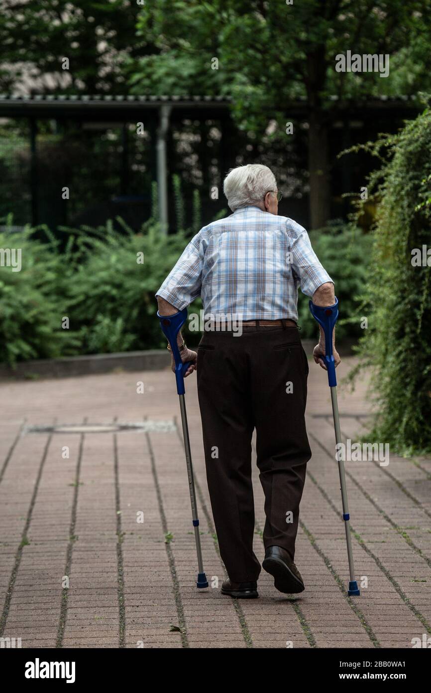 Old man walking slowly hi-res stock photography and images - Alamy