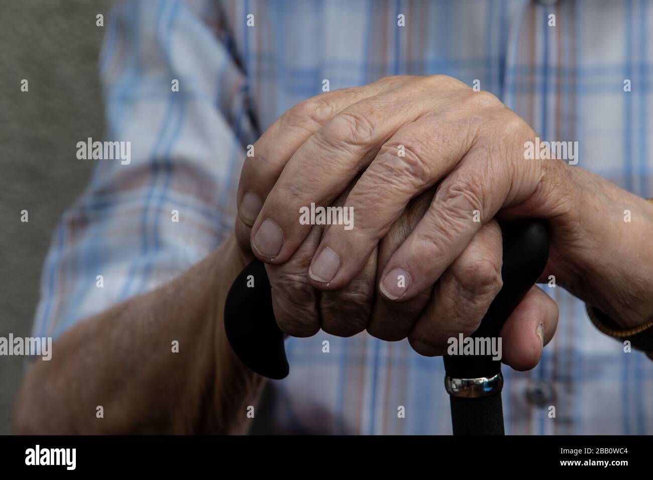 Old man with walking frame hi-res stock photography and images - Alamy