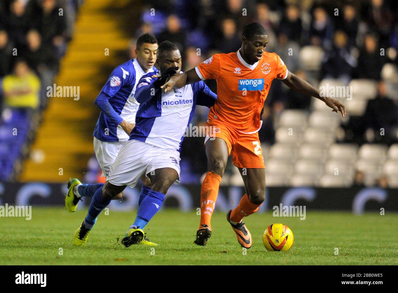 Birmingham City's Aaron McLean and Blackpool's Ramone Blackett (right ...