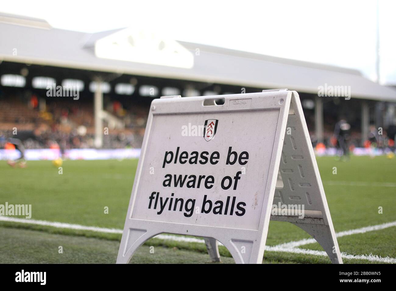 A warning sign beside the pitch during the warm-up Stock Photo - Alamy