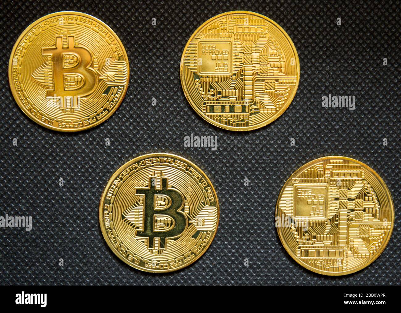virtual currency bitcoin, gold coin on black background, paper money as ...