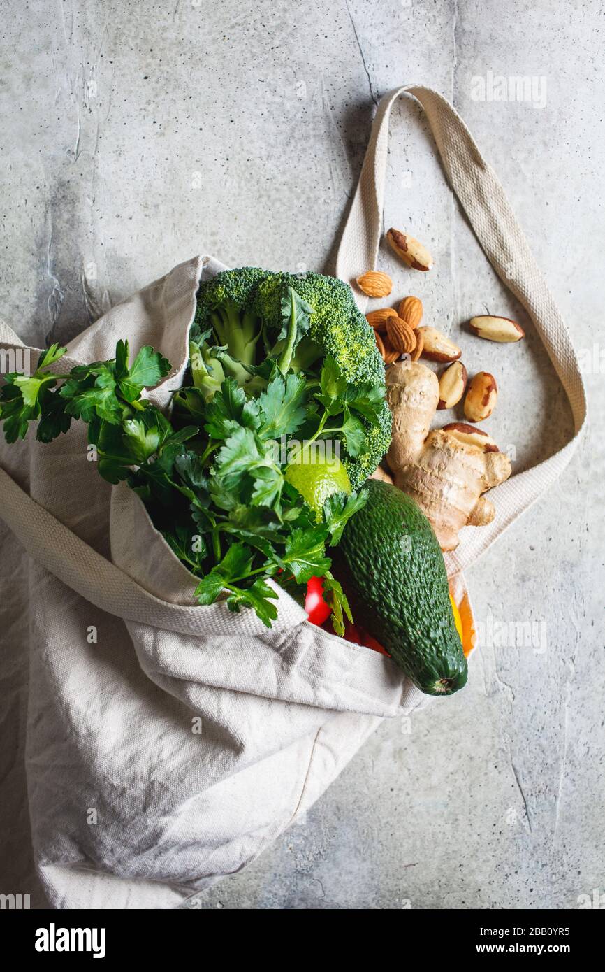 Zero waste plastic free concept. Fresh farm vegetables in white eco bag ...