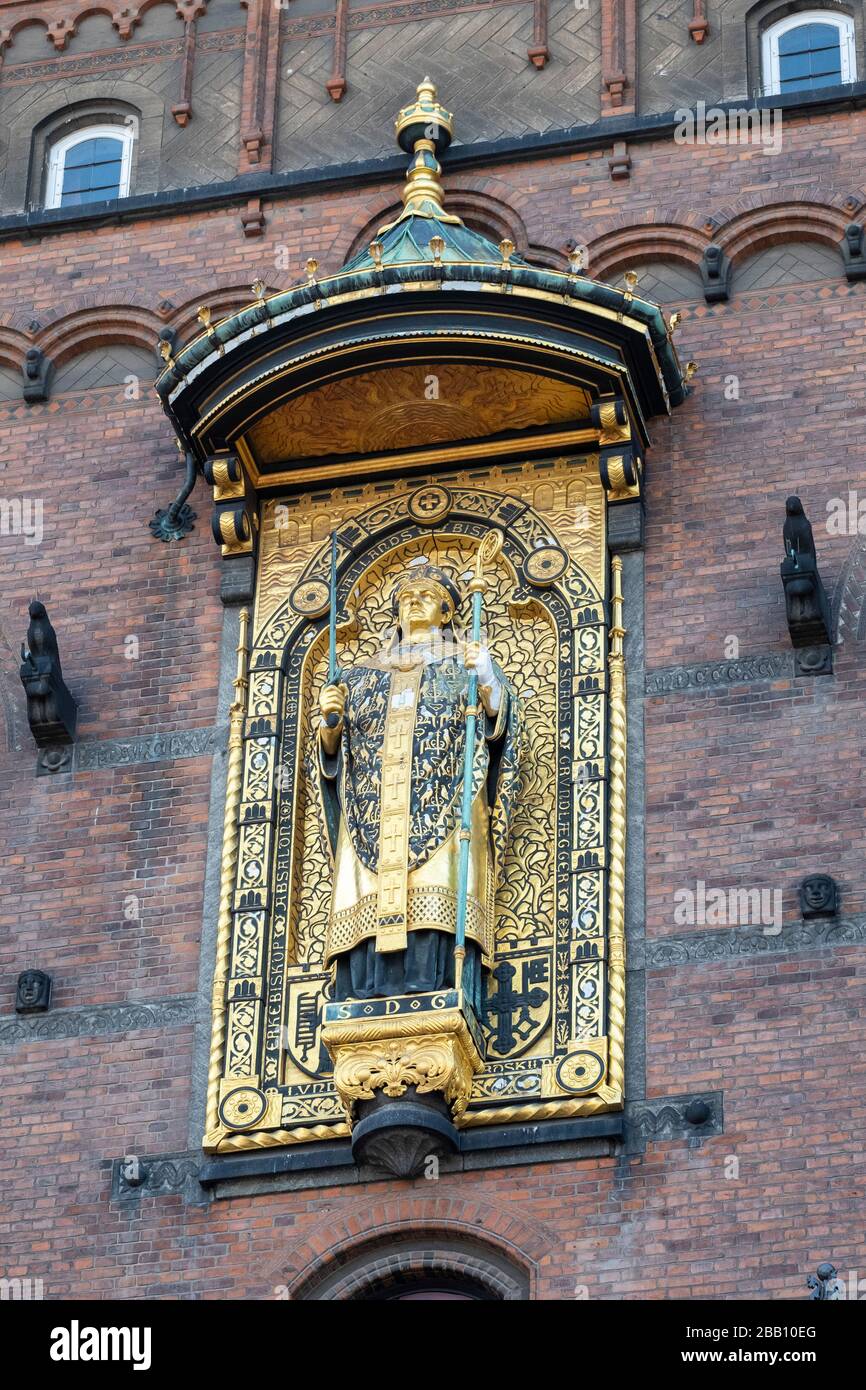 Golden Statue Of Bishop Absalon, the founder of Copenhagen, on the wall ...