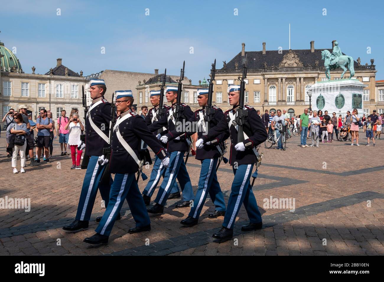 Members of the Danish Royal Guard march during the changing of the ...