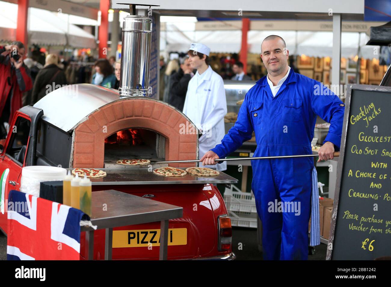 General view of a pizza oven in a converted Mini car Stock Photo - Alamy