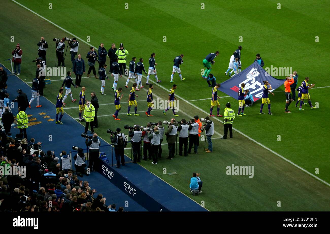 Two teams walk out onto pitch hi-res stock photography and images - Alamy