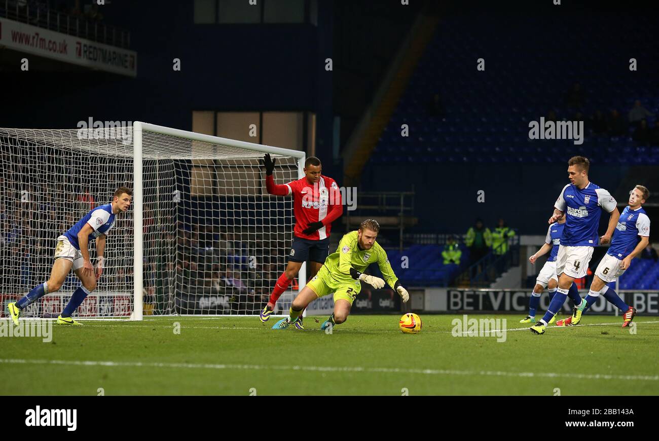 Ipswich Town's goalkeeper Dean Gerken saves at the feet of Blackburn ...