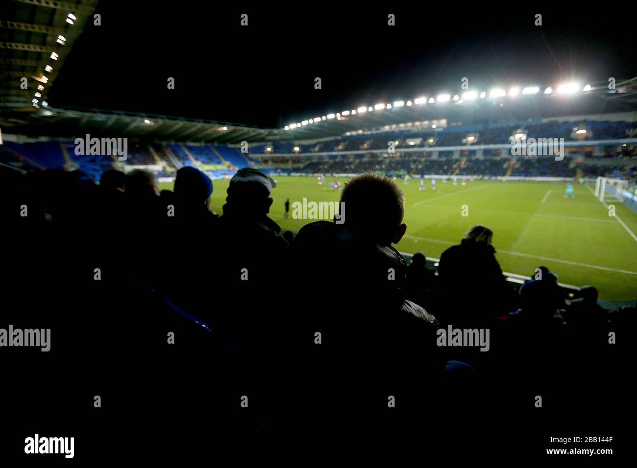 Football fans watch the match from the stands hi-res stock photography ...