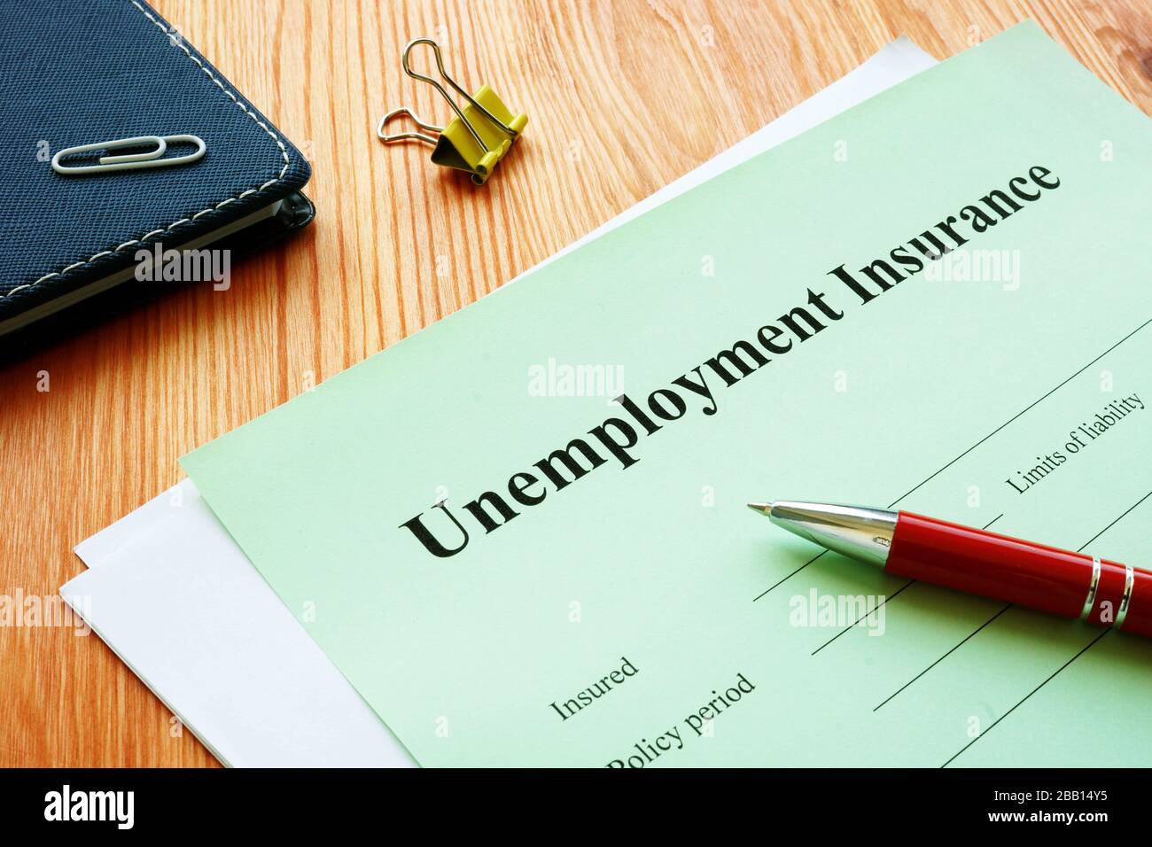 Employment insurance empty form and pen Stock Photo - Alamy