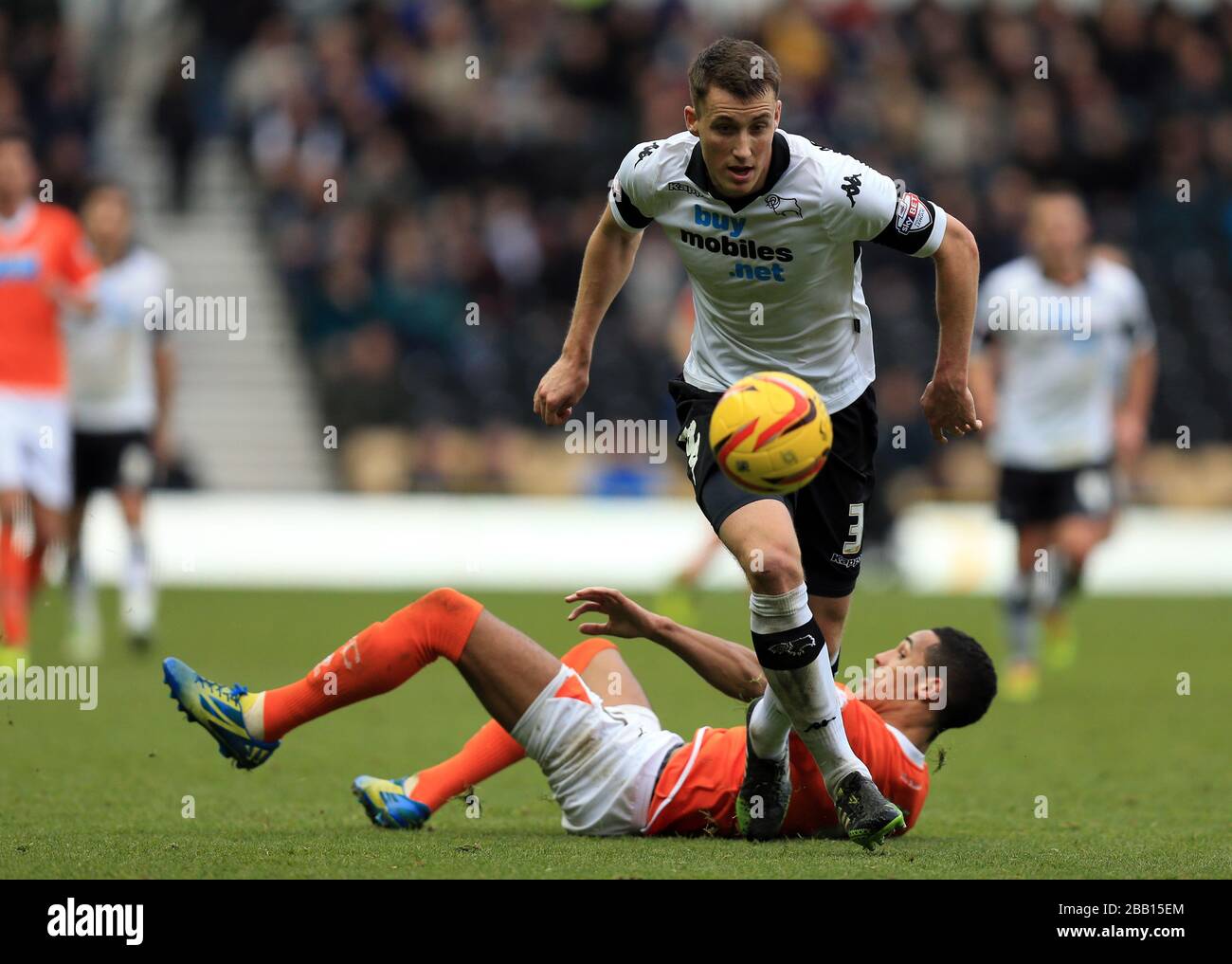 Derby County's Craig Forsyth and Blackpool's Thomas Ince in action ...