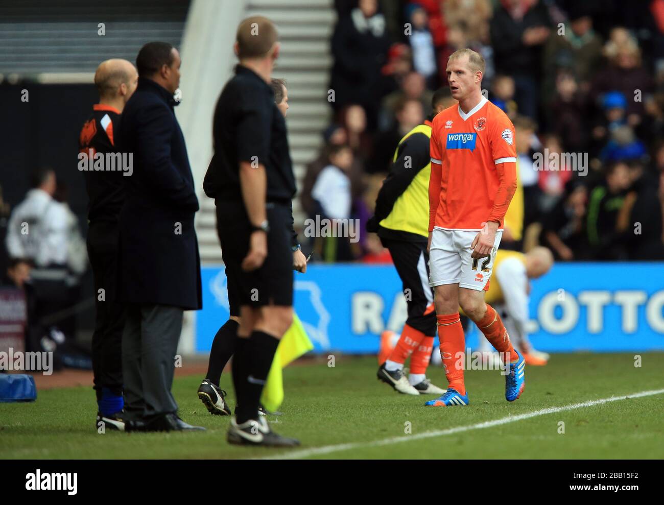 Blackpool's Neal Bishop walks off the pitch after being sent off Stock ...