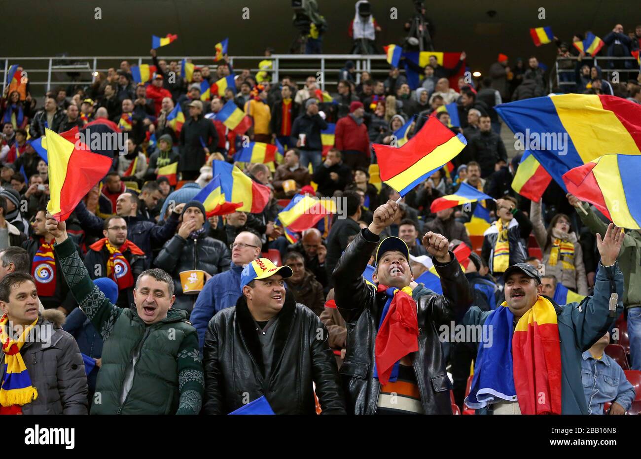 Romania fans soak up the atmosphere Stock Photo - Alamy