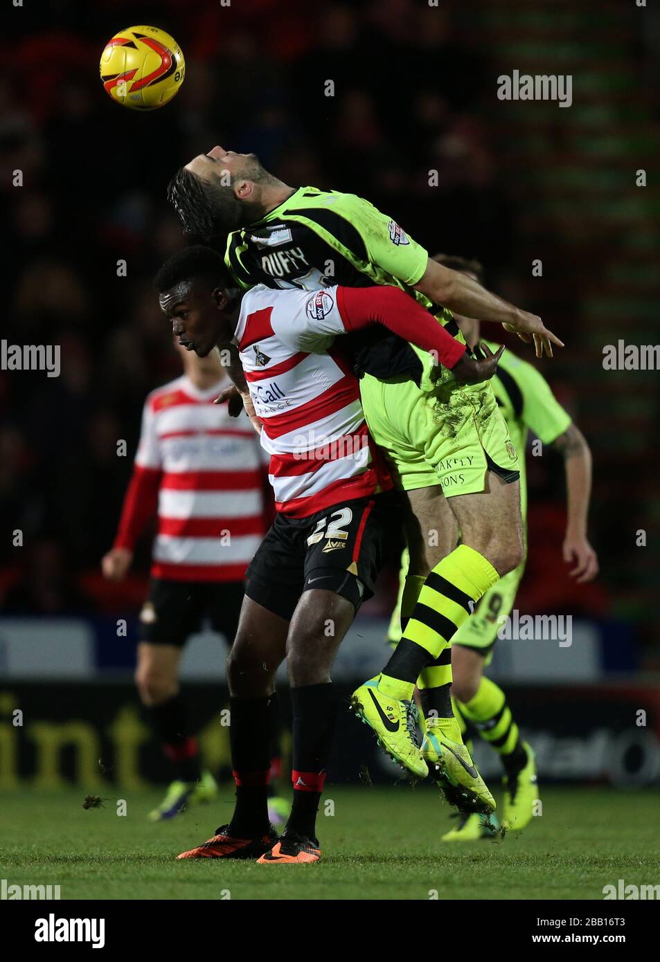 Doncaster Rovers' Theo Robinson and Yeovil Town's Shane Duffy (right ...