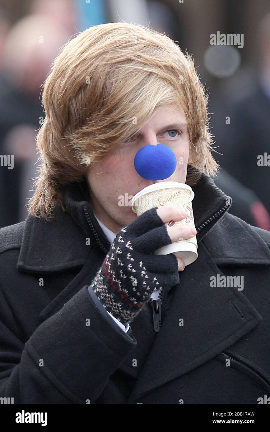 An Everton fan wearing a blue nose outside the ground Stock Photo - Alamy