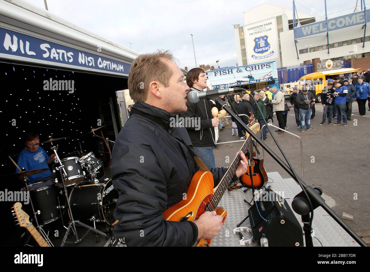 Vinyls perform in the Fan Zone outside Goodison Park before the game ...
