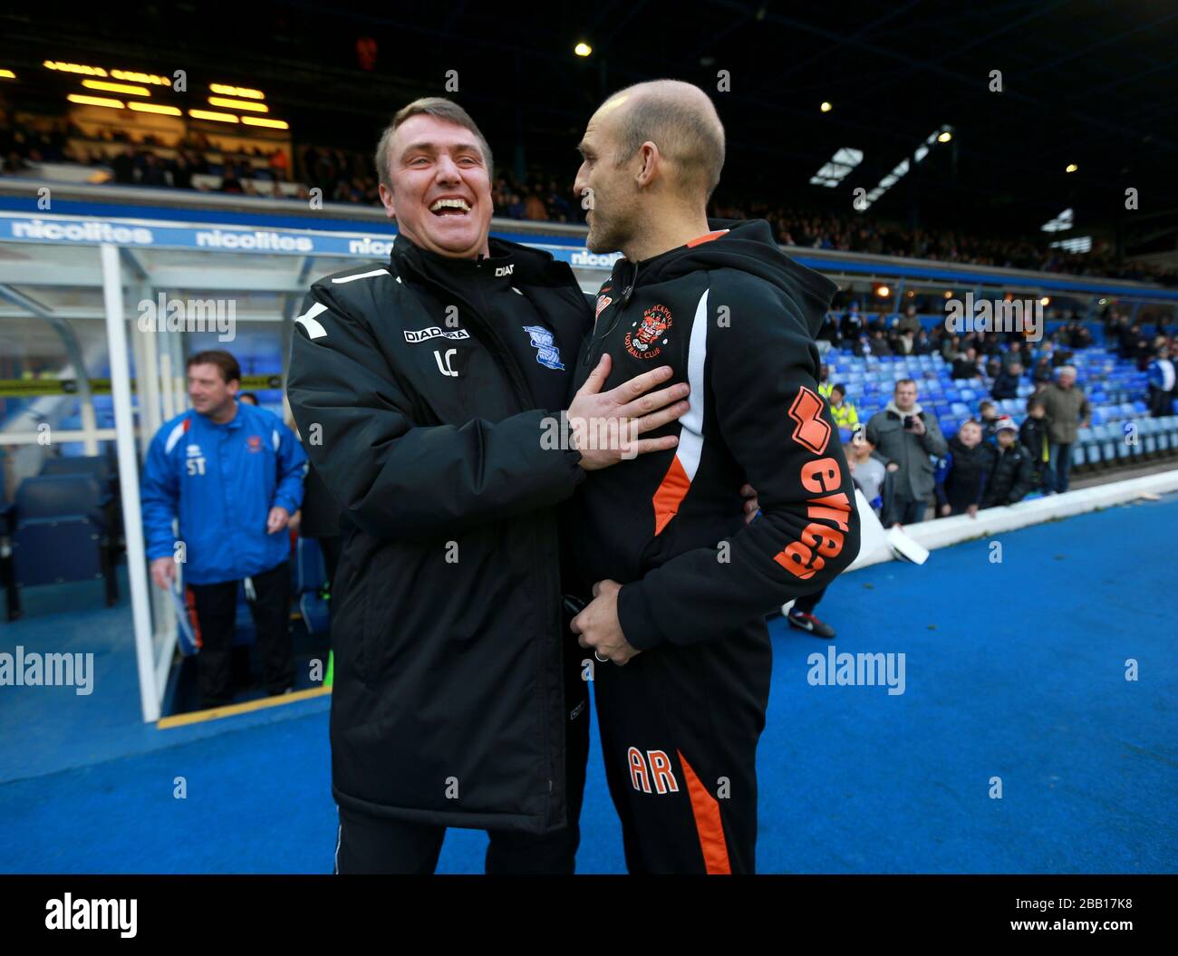 Birmingham City's manager Lee Clark (left) embraces Blackpool assistant ...