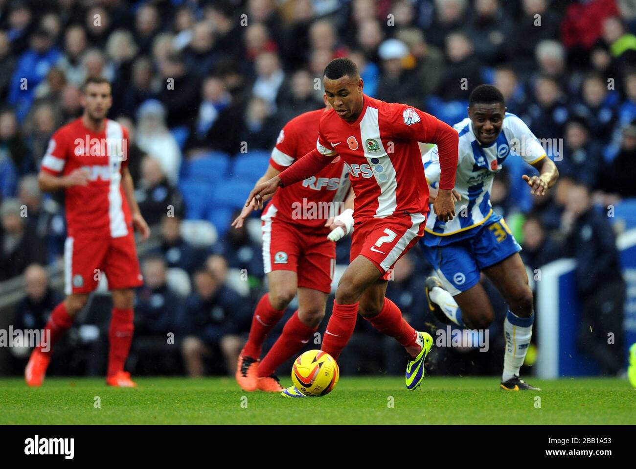 Blackburn Rovers' Joshua King (left) runs past Brighton and Hove Albion ...
