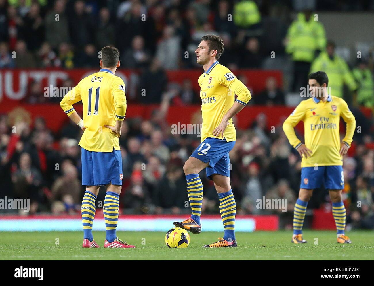 Arsenal's Olivier Giroud (right) and Mesut Ozil wait to kick-off after ...