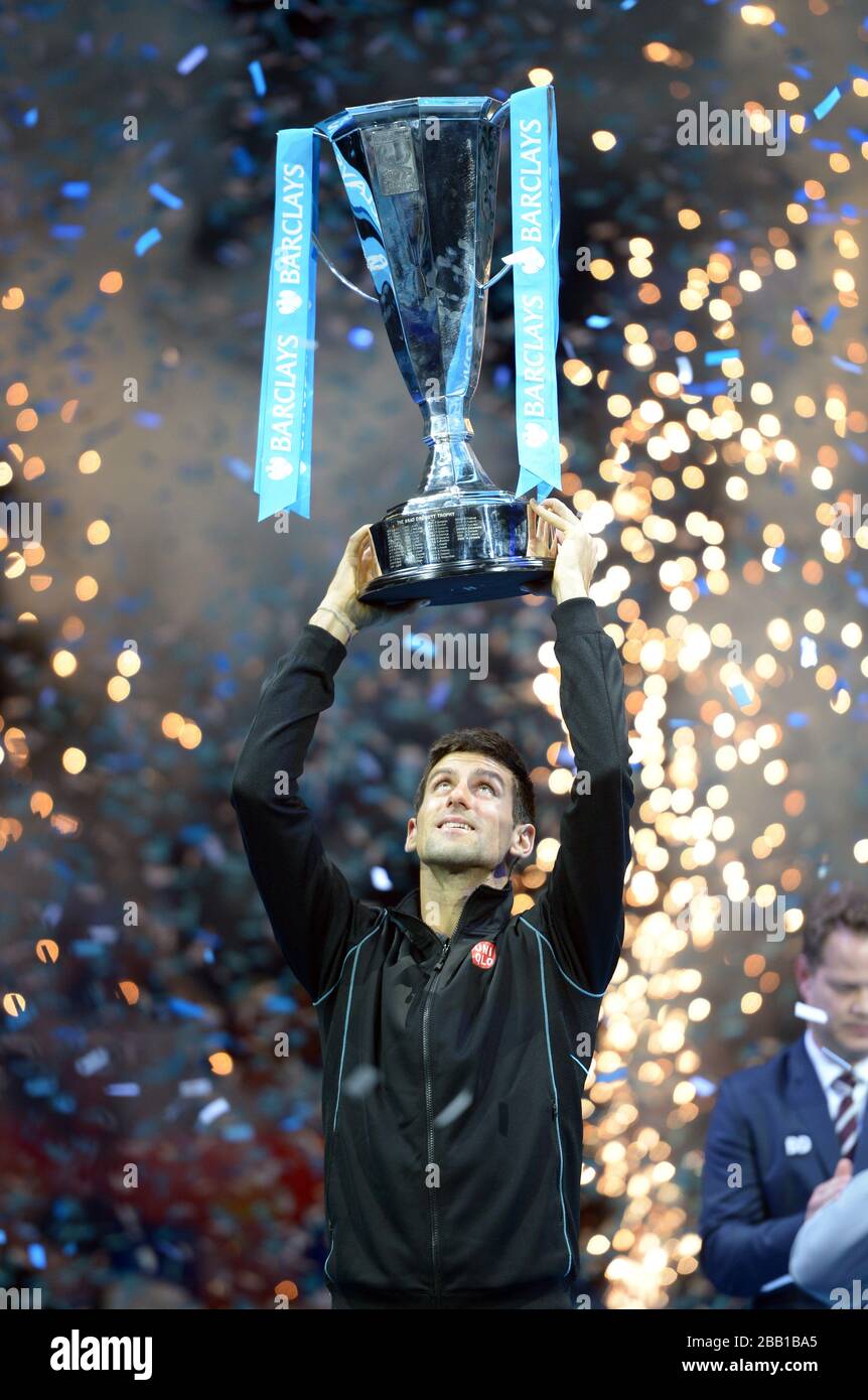Serbia's Novak Djokovic celebrates with the trophy during day eight of ...