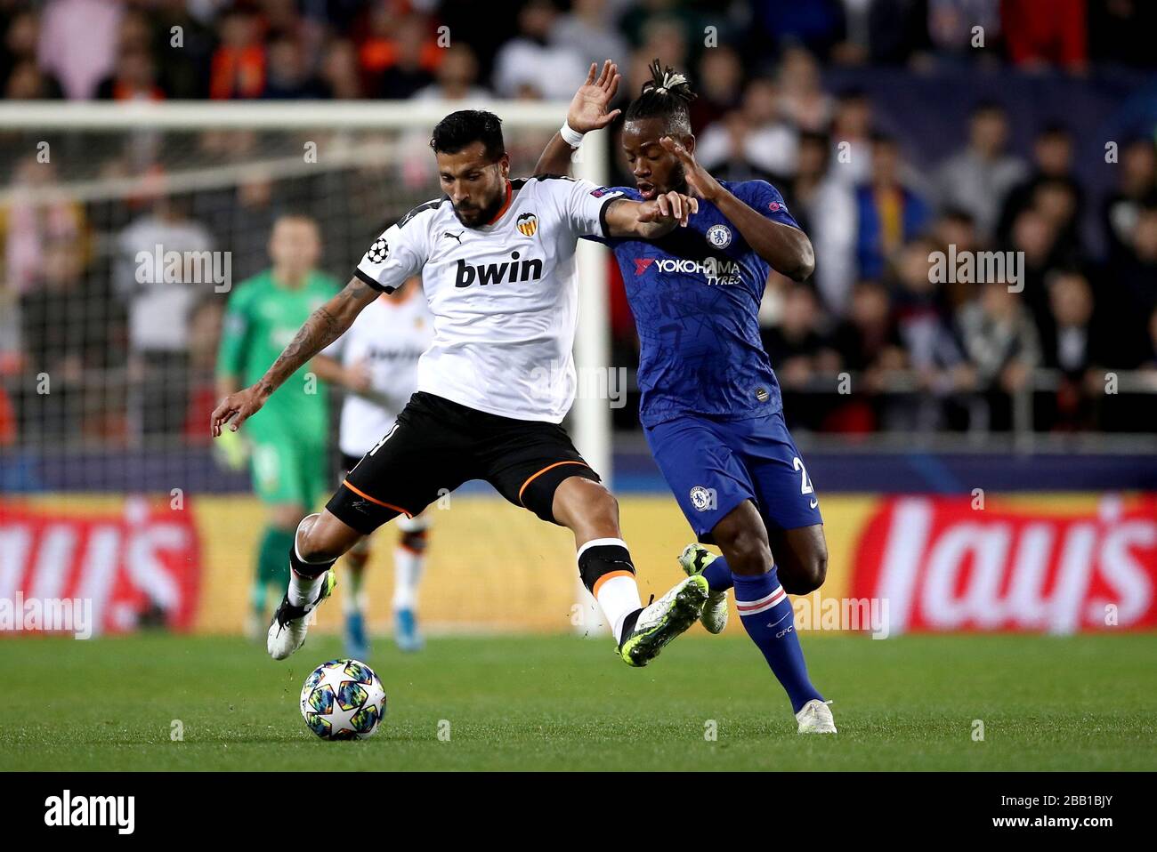 Valencia's Ezequiel Garay (left) and Chelsea's Michy Batshuayi (right ...