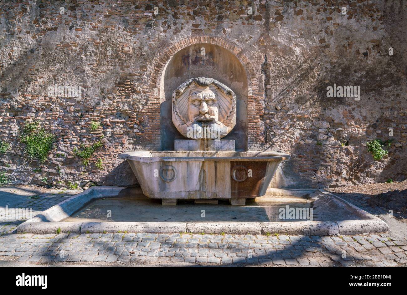 Ancient roman fountain named "Mascherone di Santa Sabina" on the ...