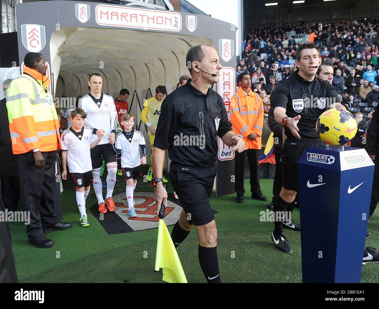 Referee Lee Probert (r) picks up the match ball Stock Photo - Alamy