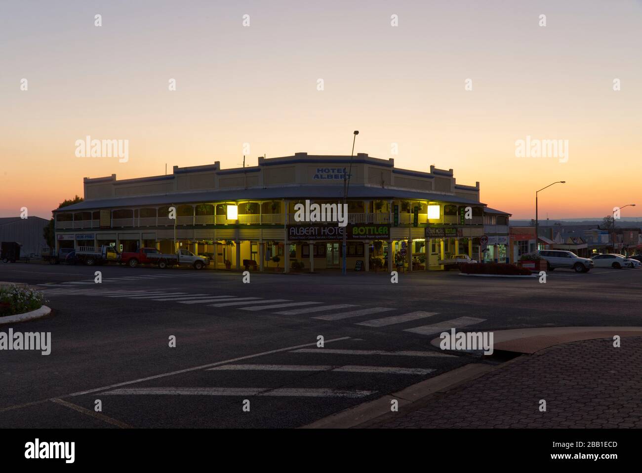 Sunset over the historic hotel Albert in the township of Monto ...
