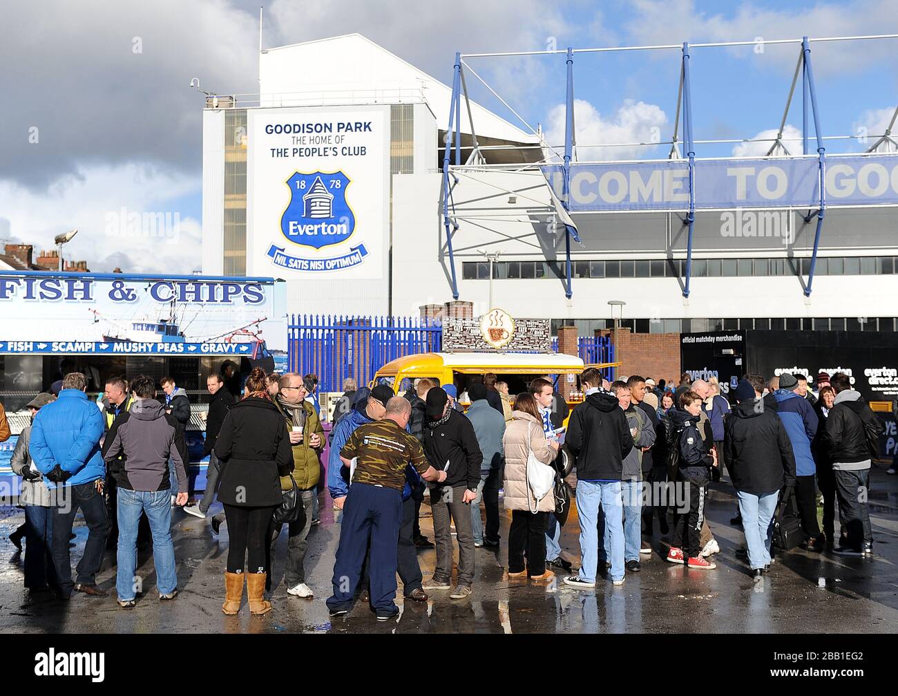 An Inside Right participant helps fans outside Goodison Park before ...