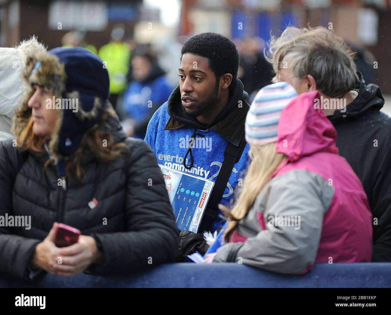 Everton staff help fans outside Goodison Park before kick-off Stock ...