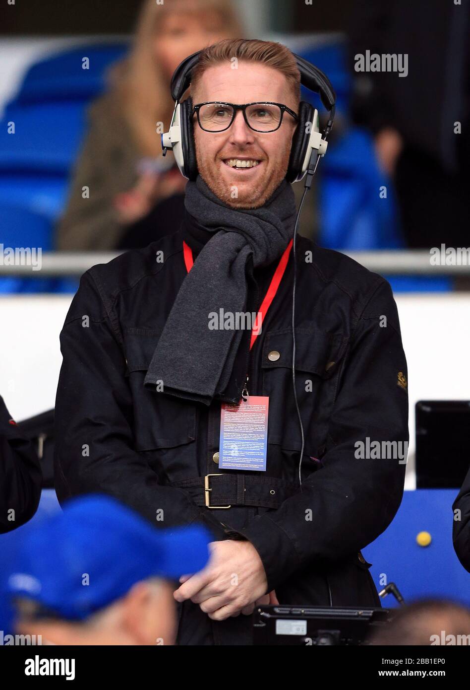 Iwan Roberts in the stands working for radio Stock Photo - Alamy