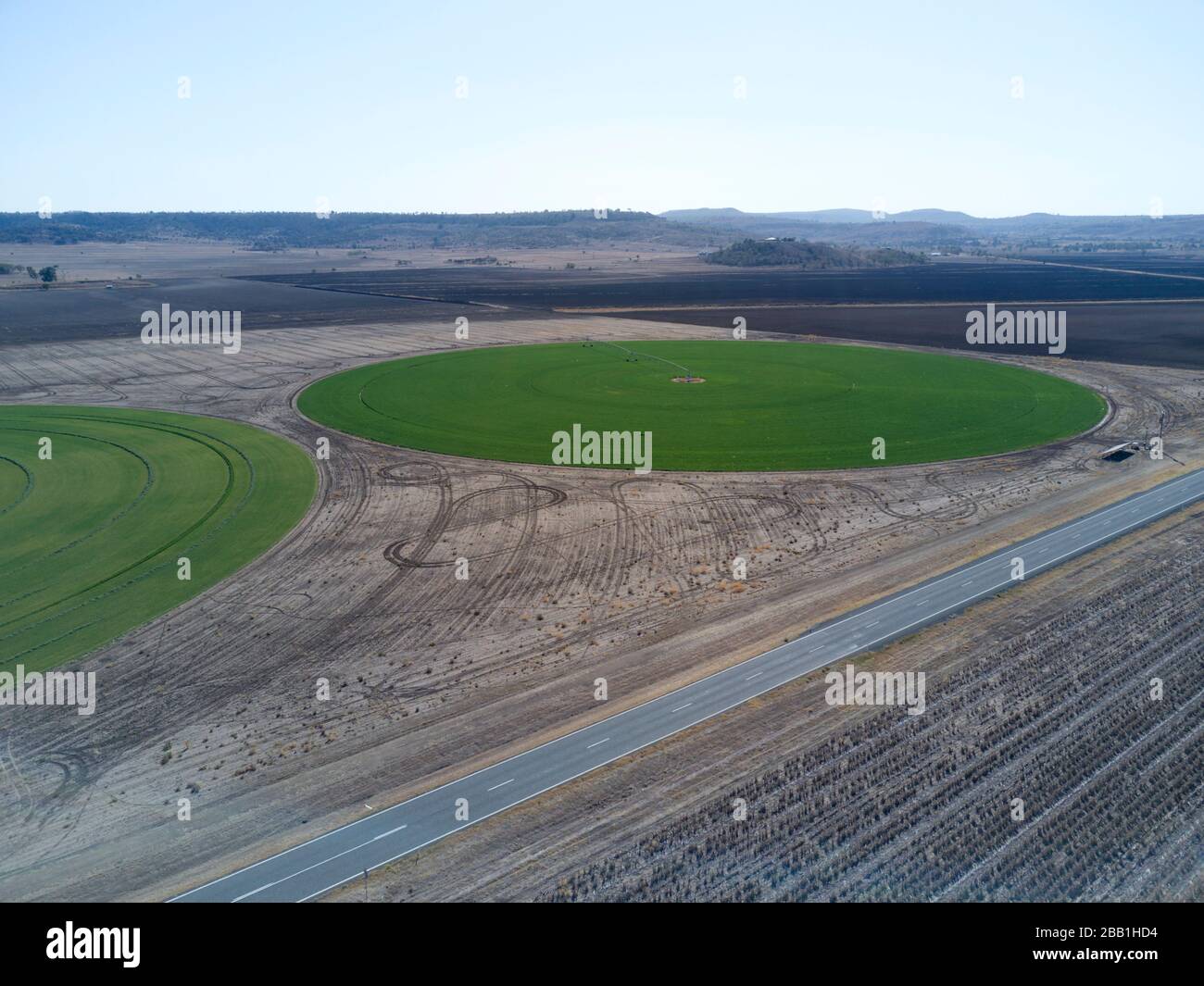Aerial of centre pivot irrigation systems producing lucerne hay in an ...