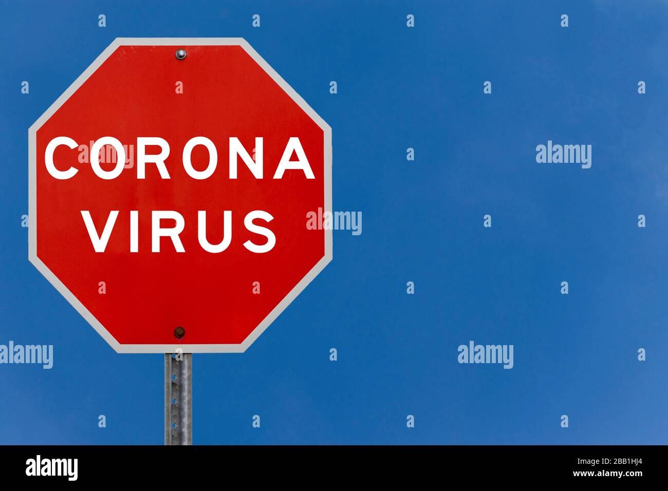 Corona virus warning sign with clear blue sky background Stock Photo ...