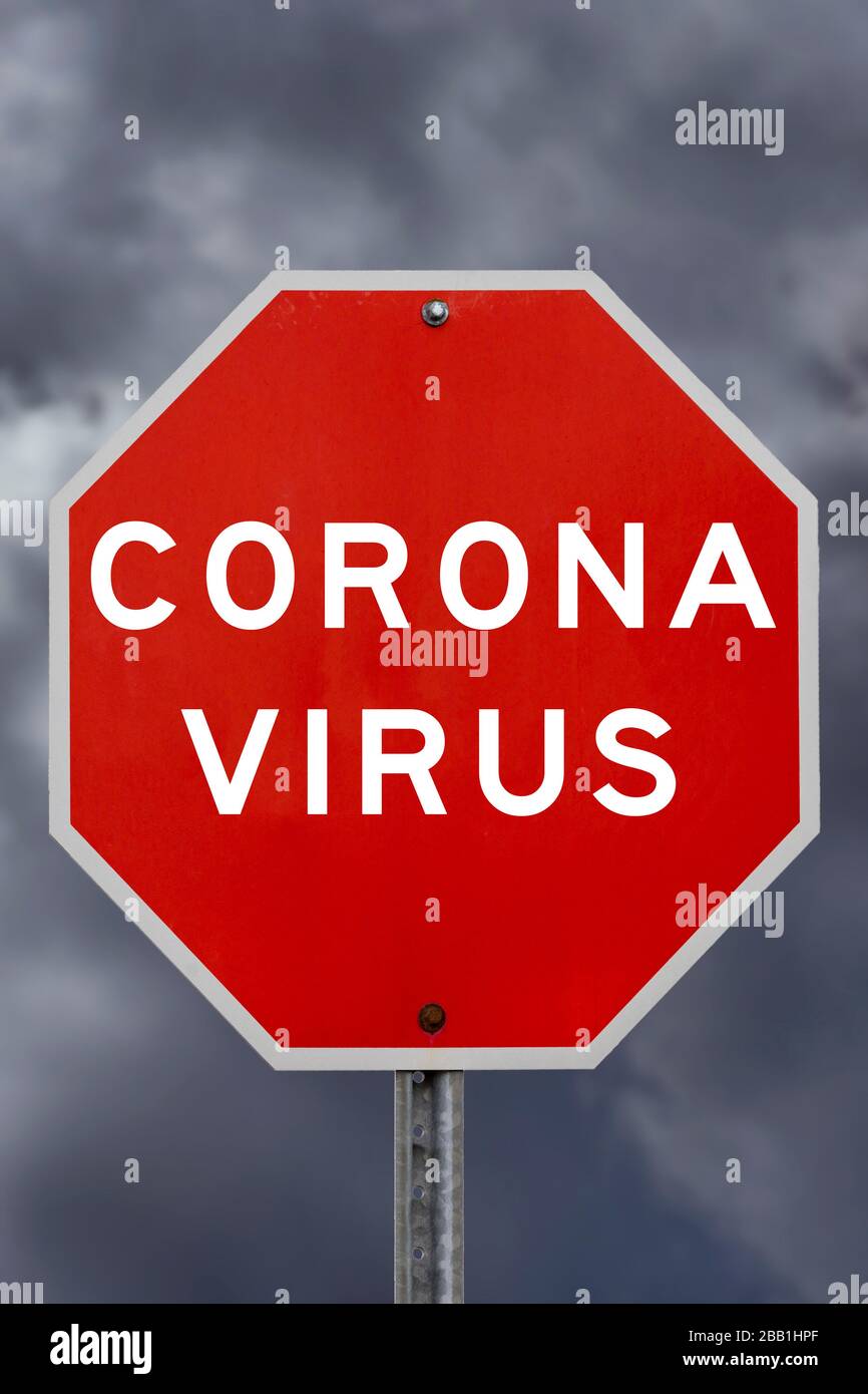 Corona virus warning sign with storm clouds in background Stock Photo ...