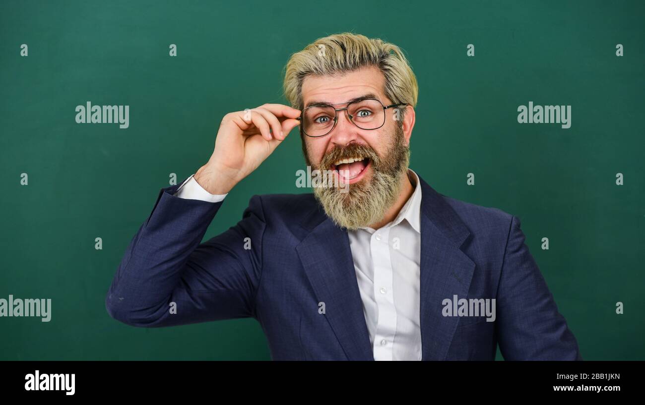 Study less, study smart. Happy teacher with smart look in glasses ...