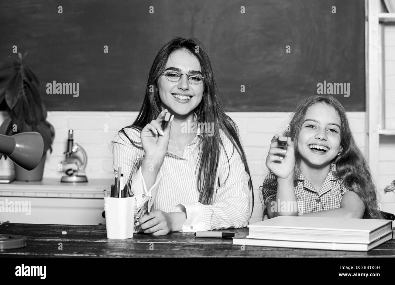 Help with homework. Homework project. Sister helping with learning ...