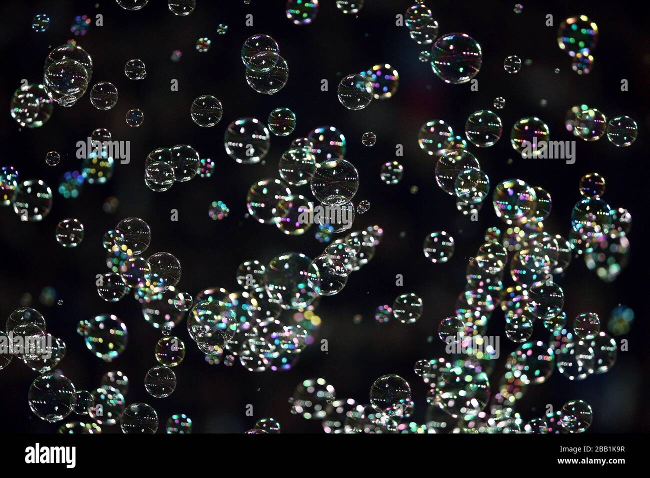 Bubbles being blown in the stadium Stock Photo - Alamy