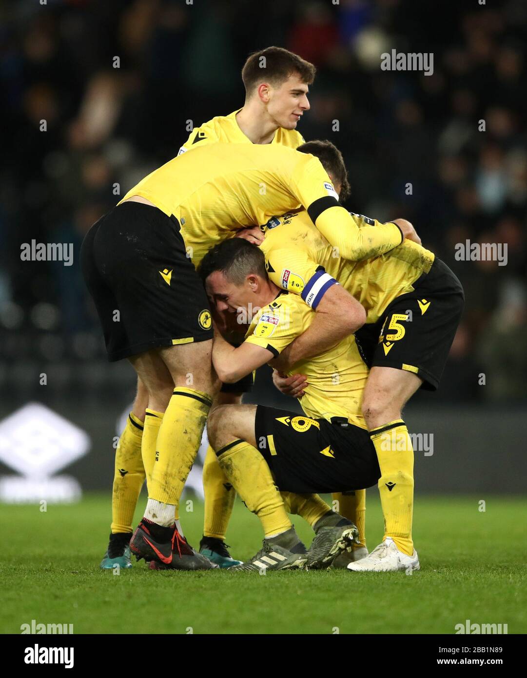 Millwall players celebrate after the final whistle hi-res stock ...