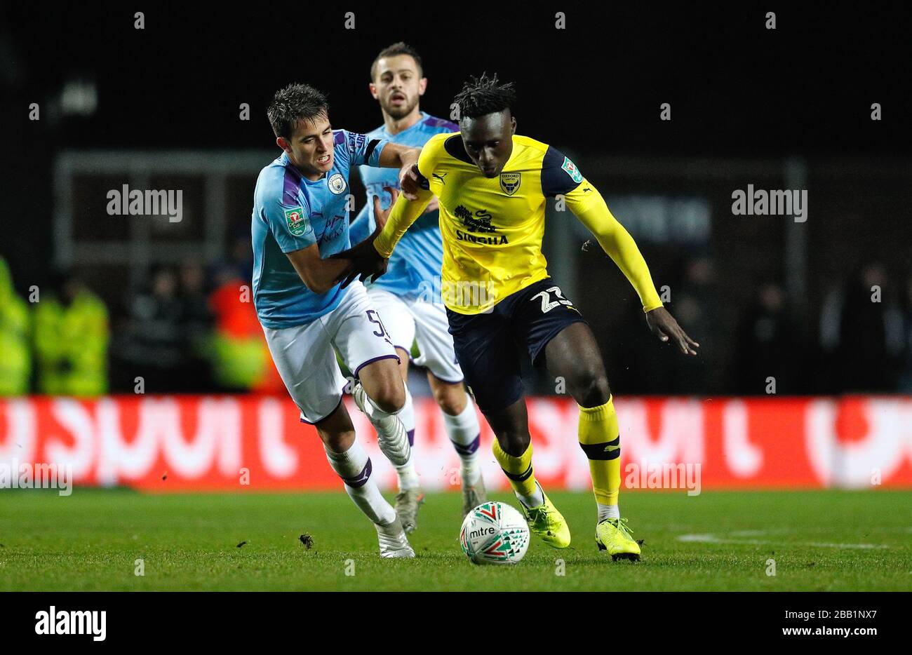 Manchester City's Eric Garcia (left) and Oxford United's Dan Agyei ...
