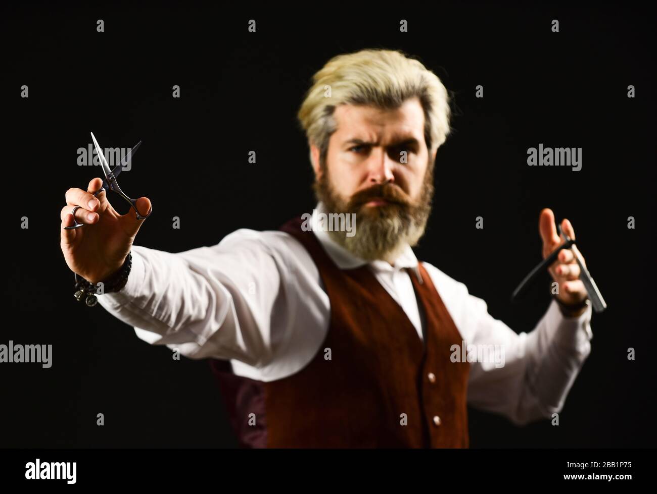 mustache and beard trims. ready to cut his clients. vintage barber shop ...